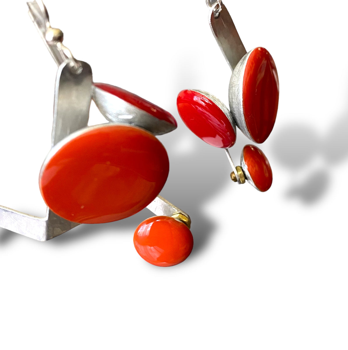 RENEW 1 Compact Multi-Directional Earrings from the HARVEST Collection ...